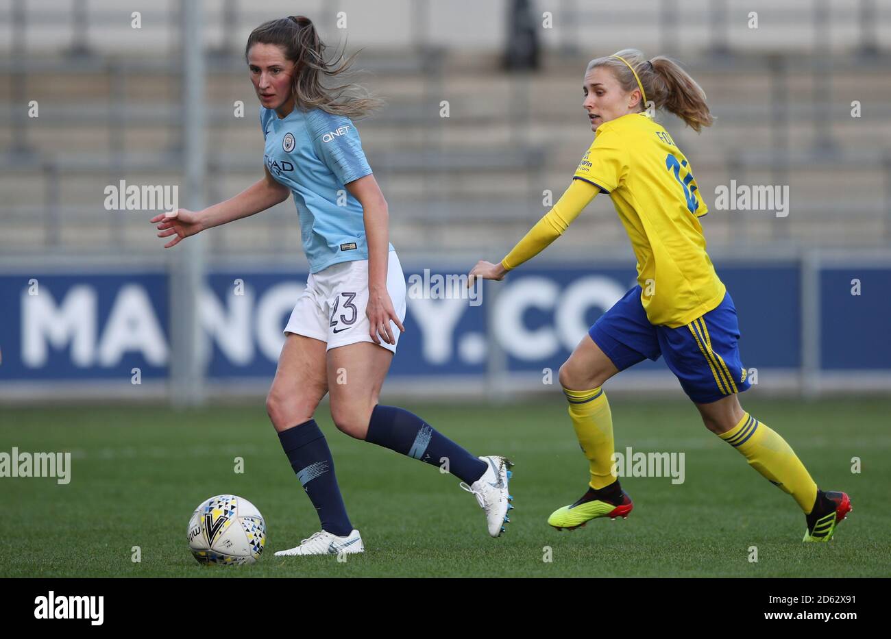 Manchester City's Abbie McManus holds off challenge from Birmingham ...