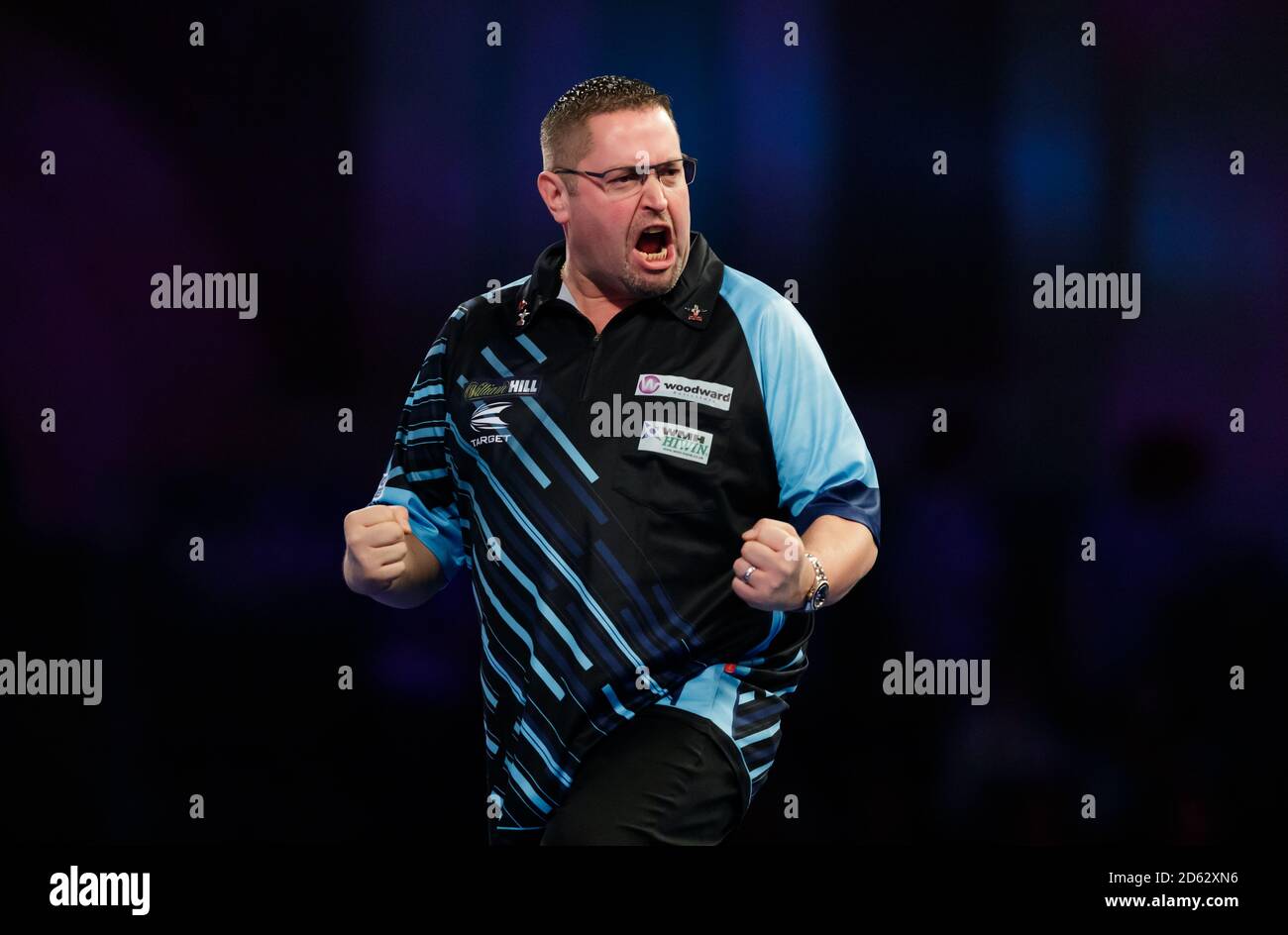 Alan Norris celebrates during his match against Ryan Joyce during day ...