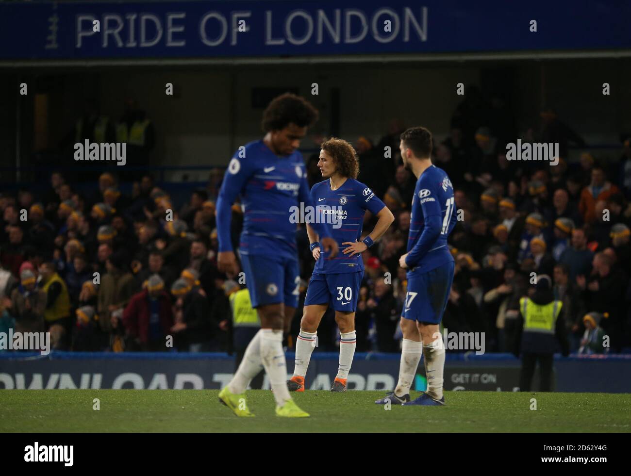 Chelsea's players look dejected after Jamie Vardy's first score Stock ...