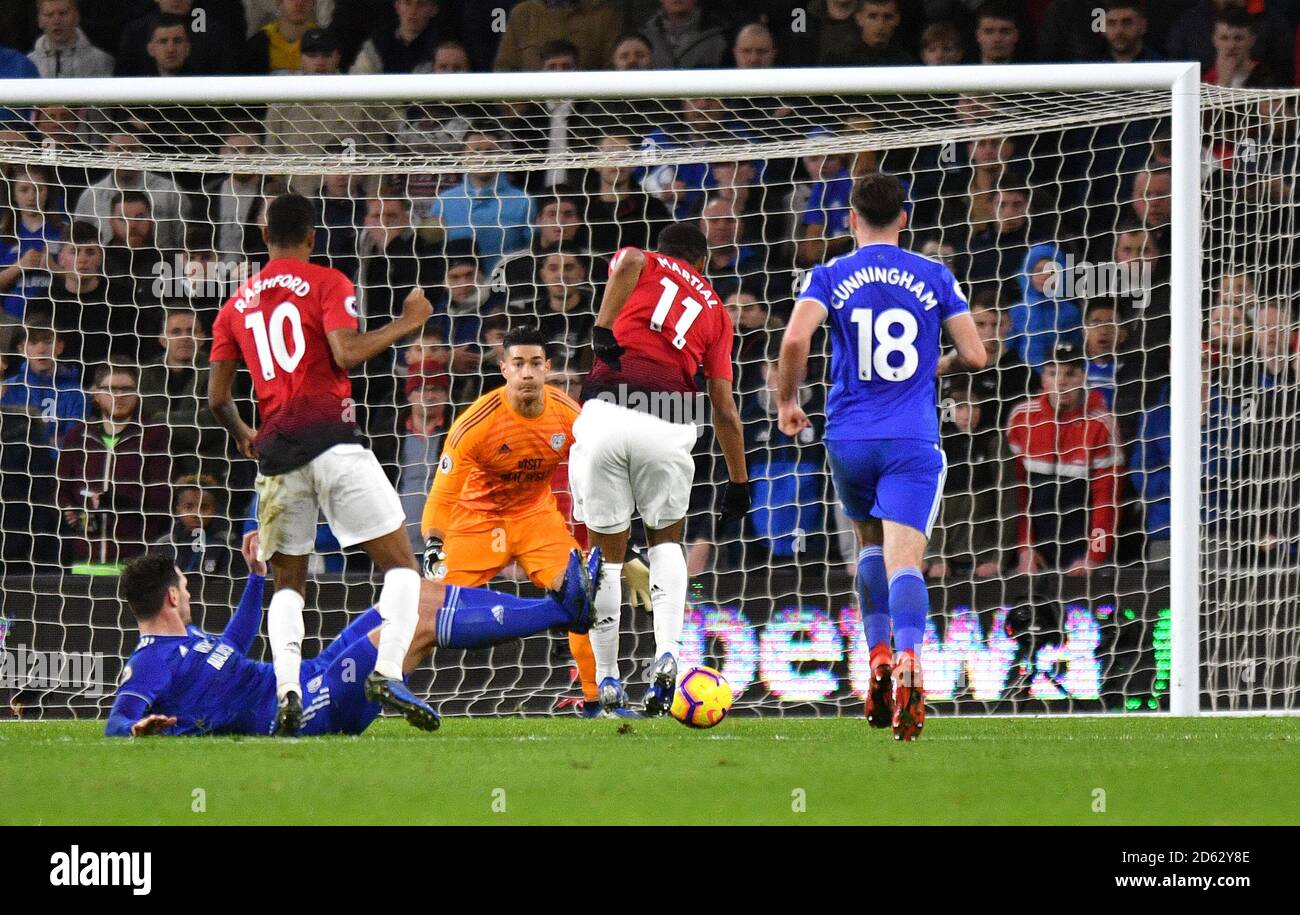 Manchester United's Anthony Martial (centre) scores his side's third ...