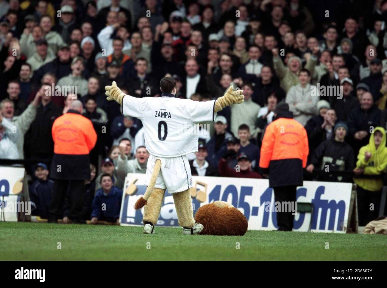 Headless Millwall mascot Zampa the Lion plays to the crowd Stock Photo ...