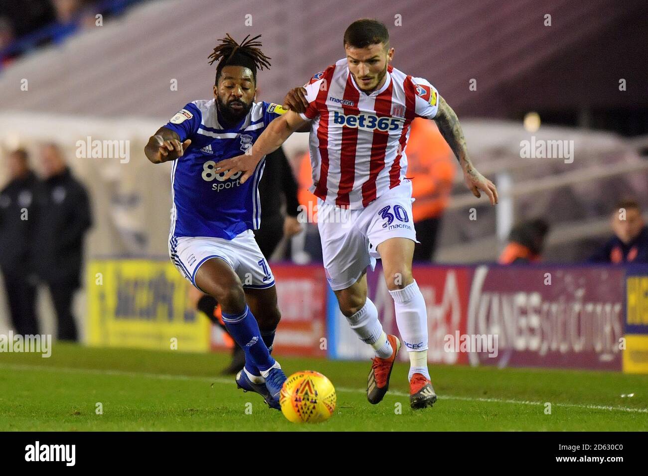 Birmingham City's Jacques Maghoma (left) and Stoke City's Tom Edwards ...