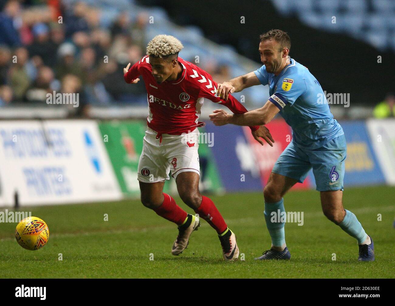 Coventry City's Liam Kelly (right) and Charlton Athletic's Lyle Taylor ...