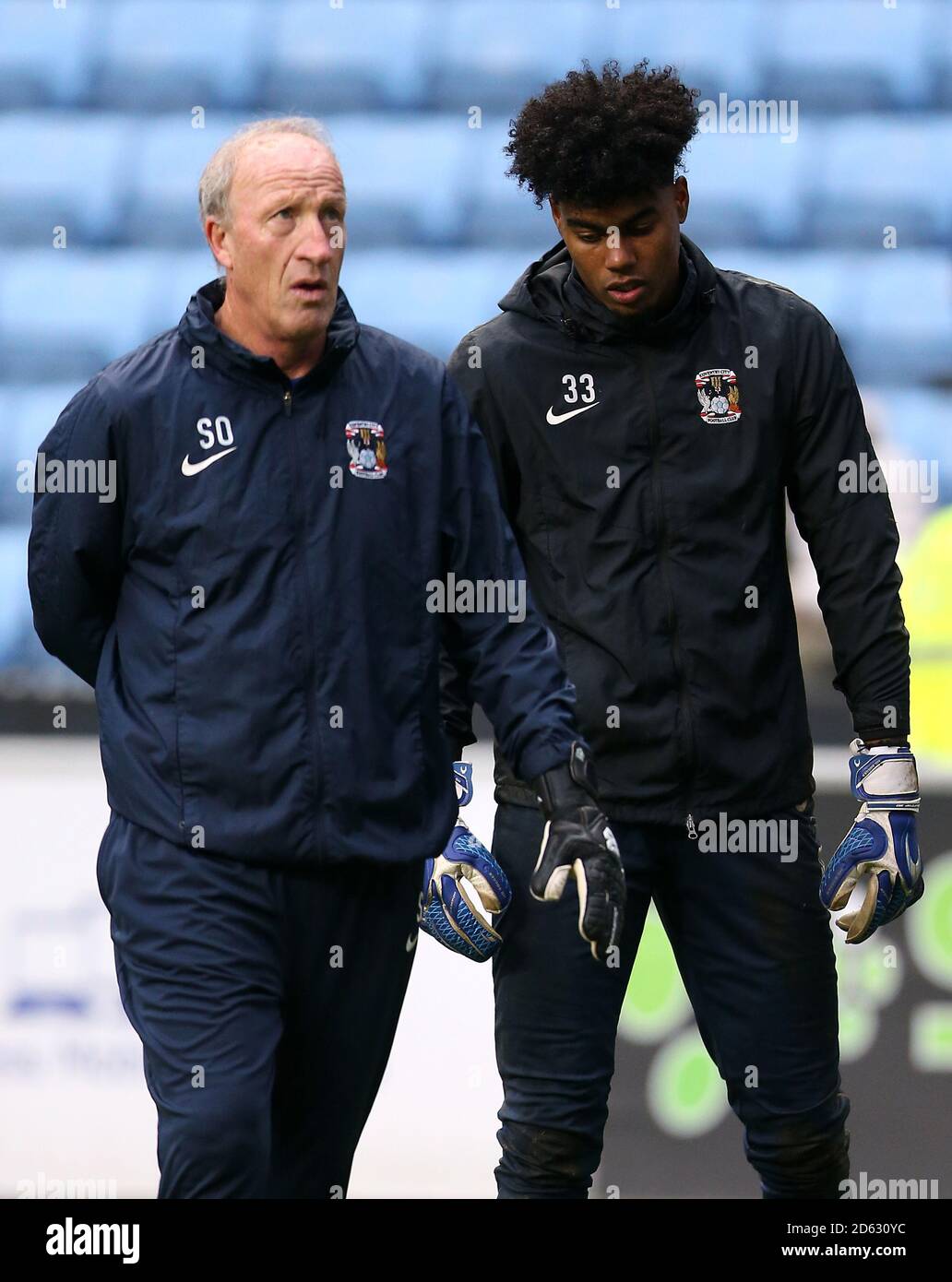 Coventry City goalkeeping coach Steve Ogrizovic (left) and goalkeeper ...