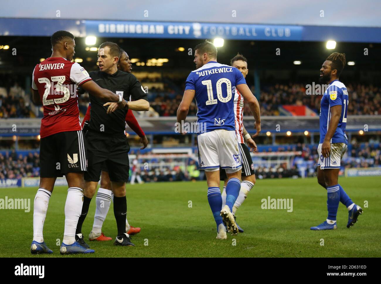 Referee Peter Bankes has to calm tempers between Birmingham City's and ...
