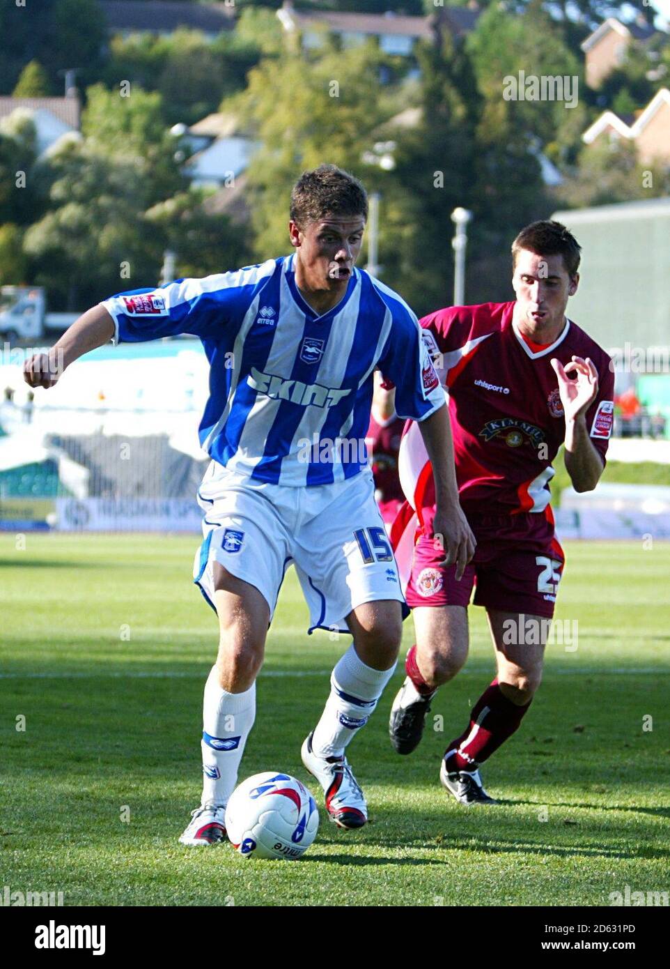 Blackpool's Shaun Barker battles for the ball against Brighton & Hove ...