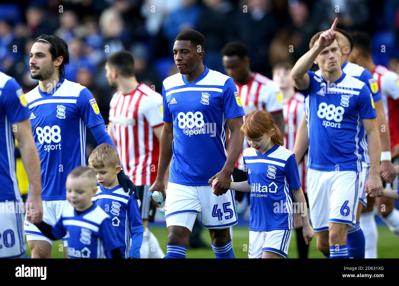 Birmingham City's Wes Harding (centre) walks out on to the pitch prior ...