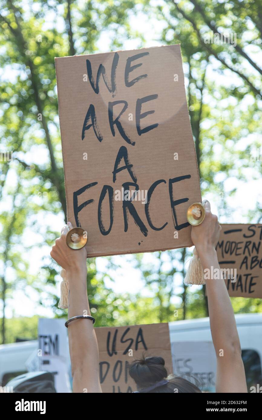 Protester Holding up Sign, "We are a Force" at Black Lives Matter March ...