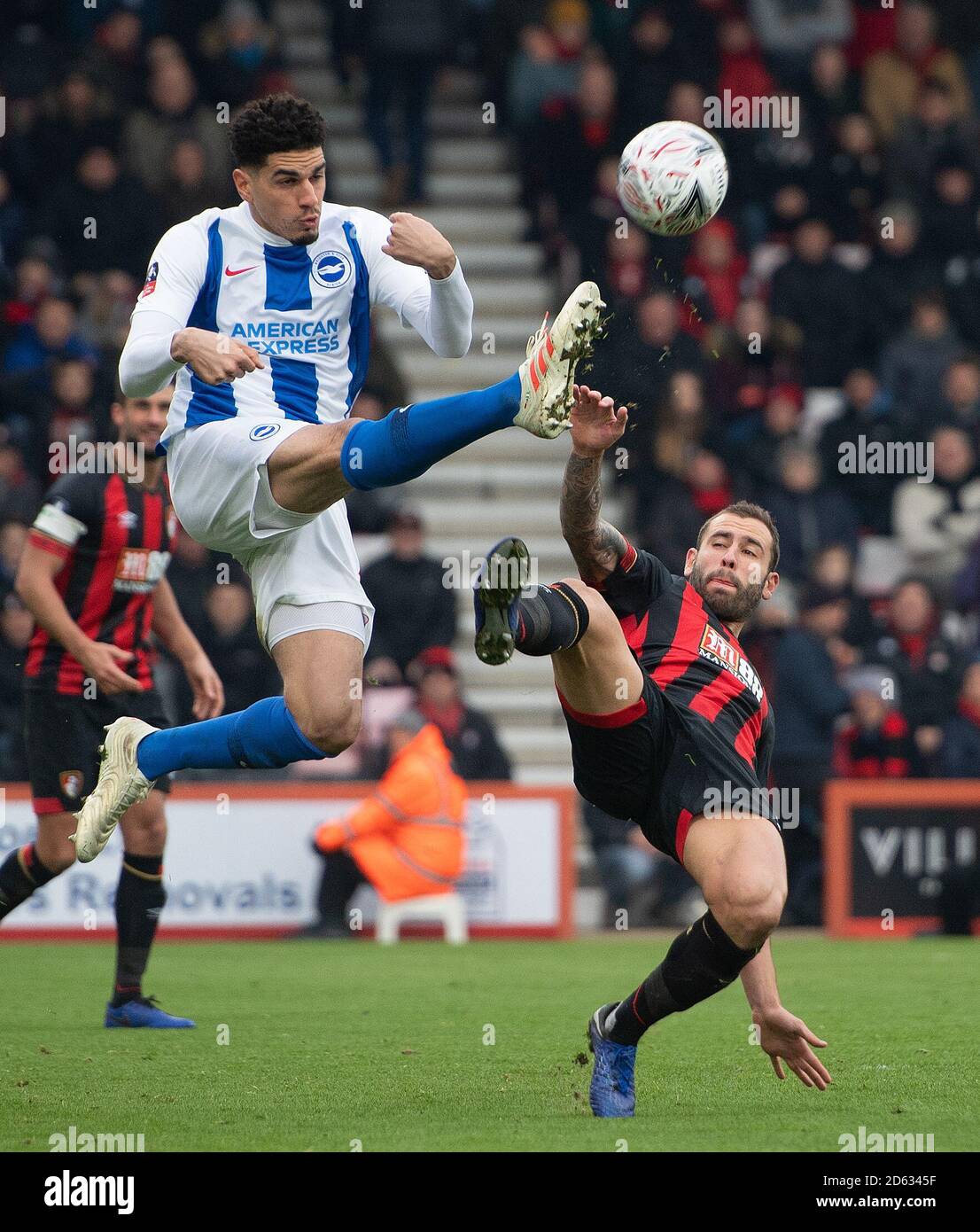 Brighton & Hove Albion's Leon Balogun battles with Steve Cook Stock ...