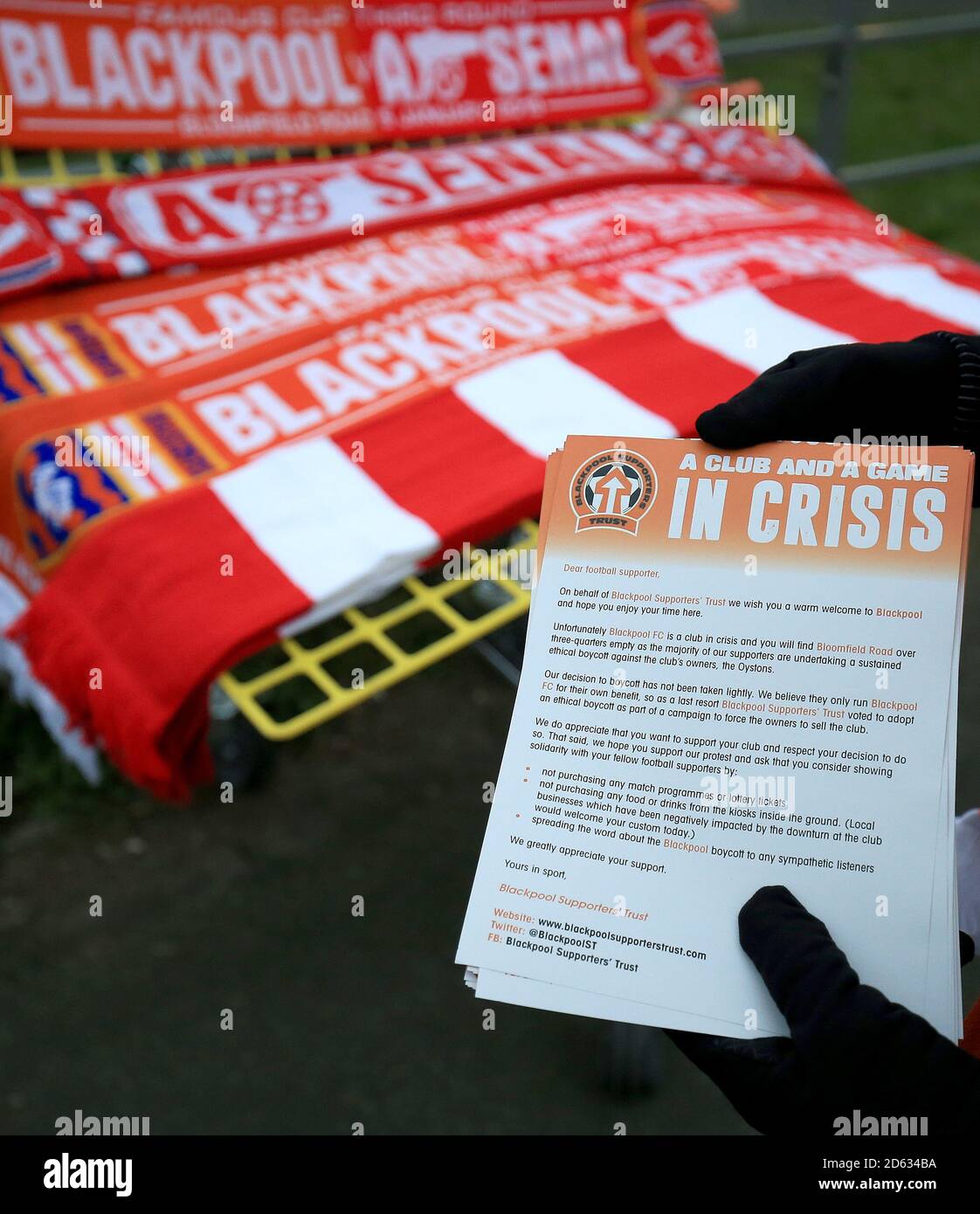 Leaflets protesting about the club owners are handed out outside the ...