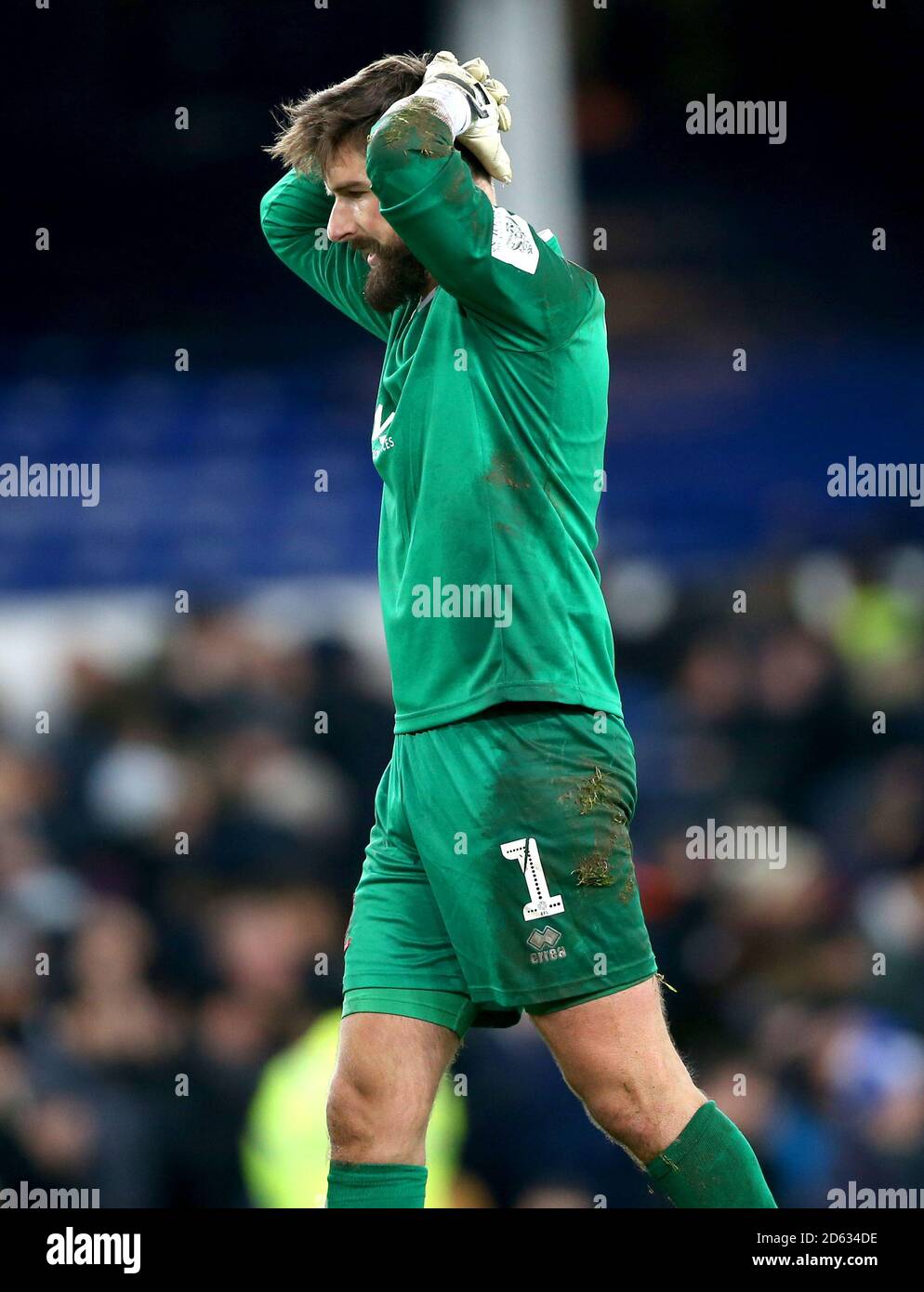 Lincoln City's Goalkeeper Josh Vickers appears dejected at the end of ...