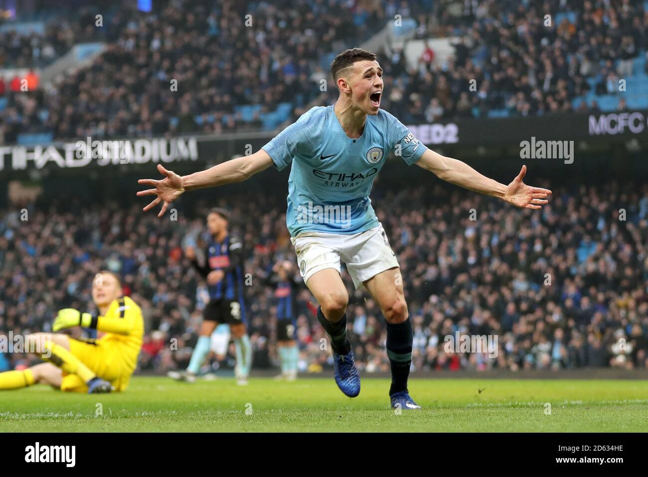 Manchester City's Phil Foden celebrates scoring his side's second goal ...