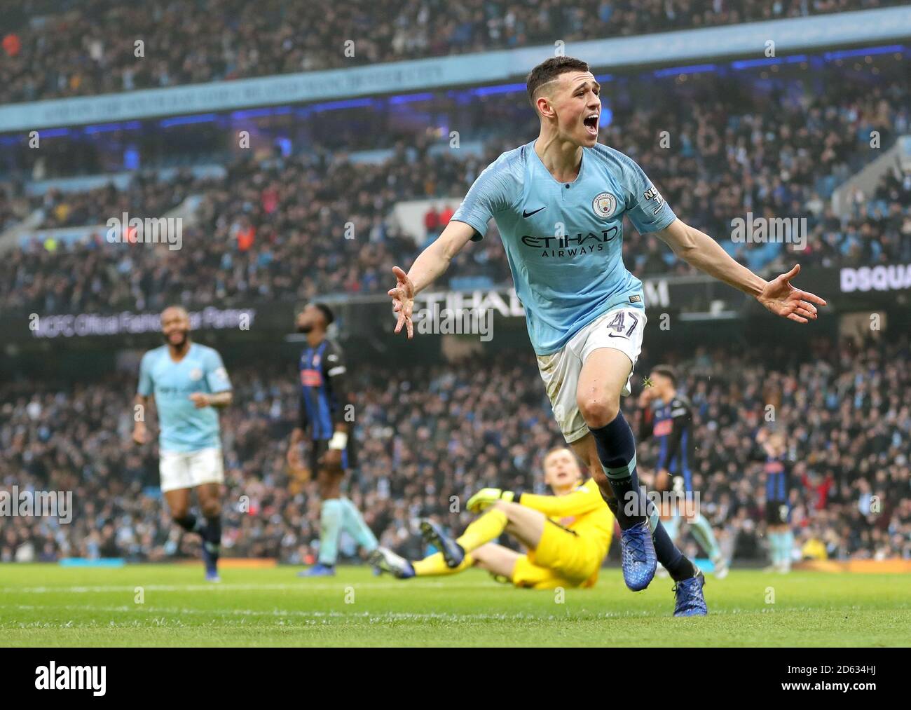 Manchester City's Phil Foden celebrates scoring his side's second goal ...