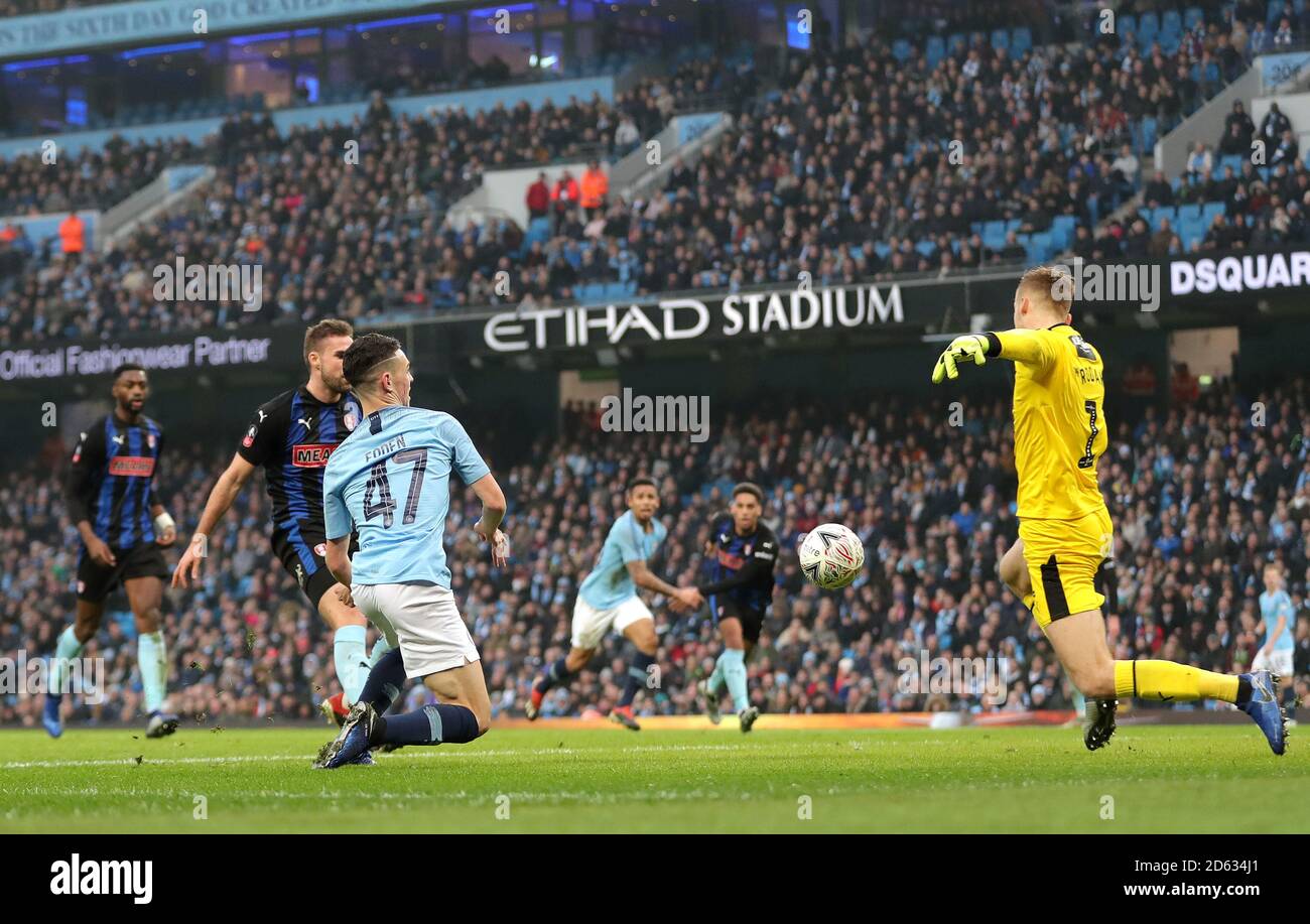 Manchester City's Phil Foden (left) takes a shot on goal Stock Photo ...