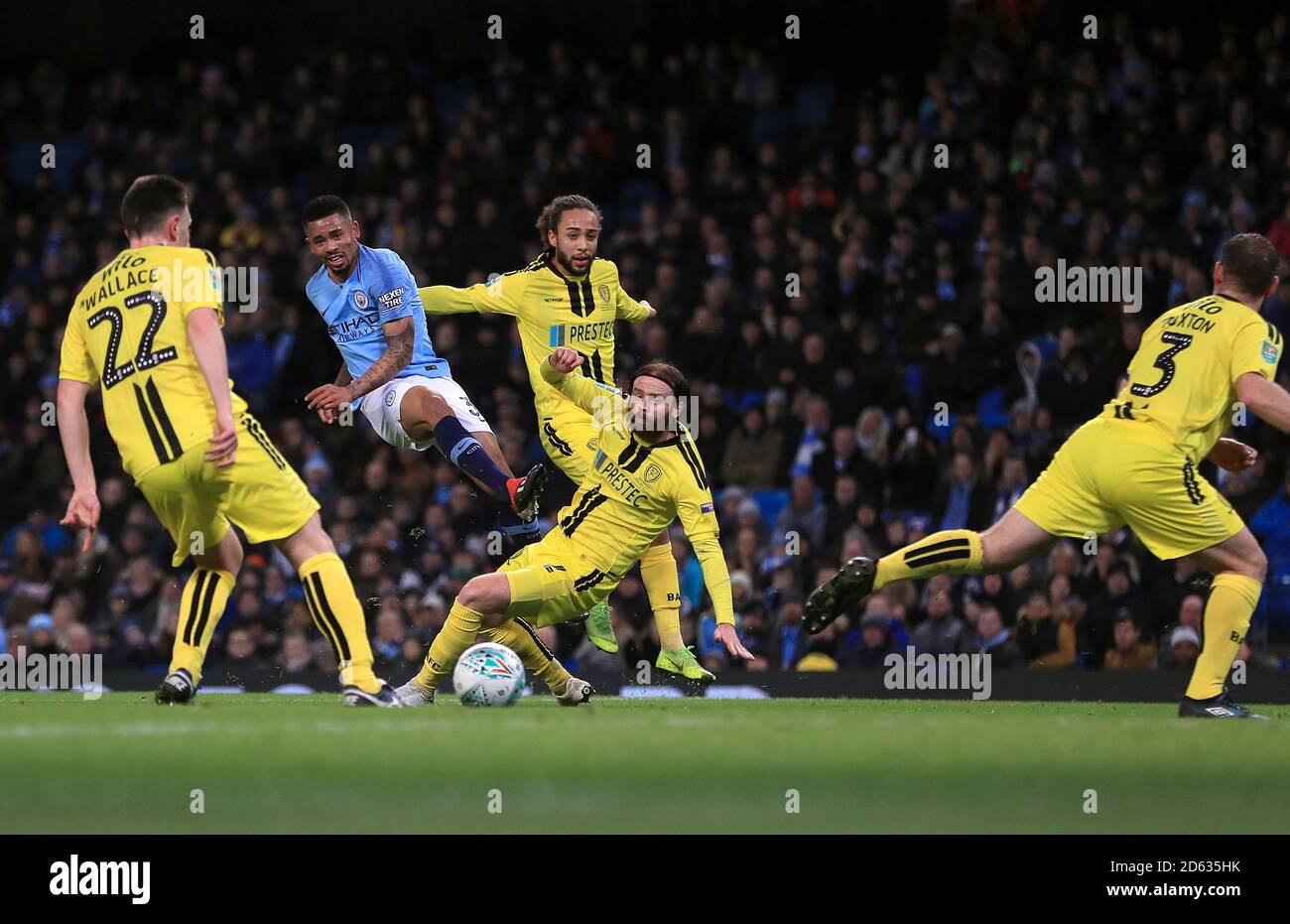 Manchester City's Gabriel Jesus has a shot on goal, under pressure from ...