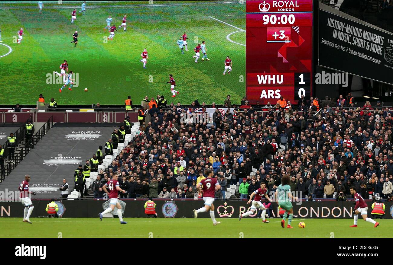 General view of the scoreboard behind Arsenal fans Stock Photo - Alamy
