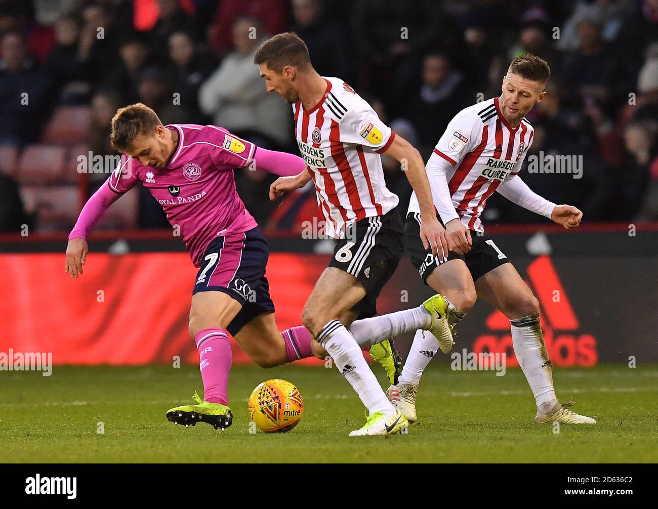 Queens Park Rangers' Luke Freeman battles with Sheffield United's Chris ...