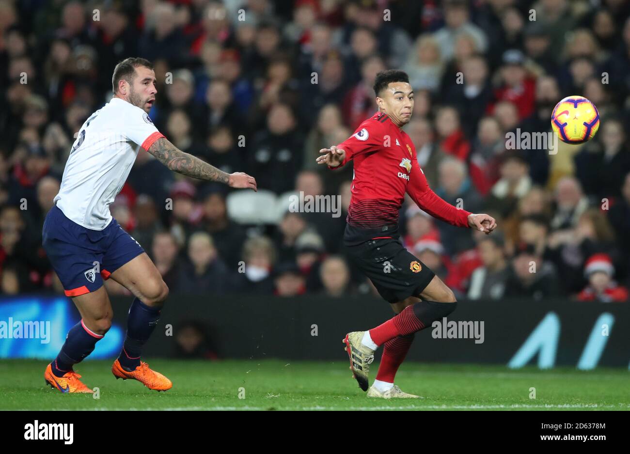 Manchester United's Jesse Lingard wins ball off Bournemouth's Steve ...