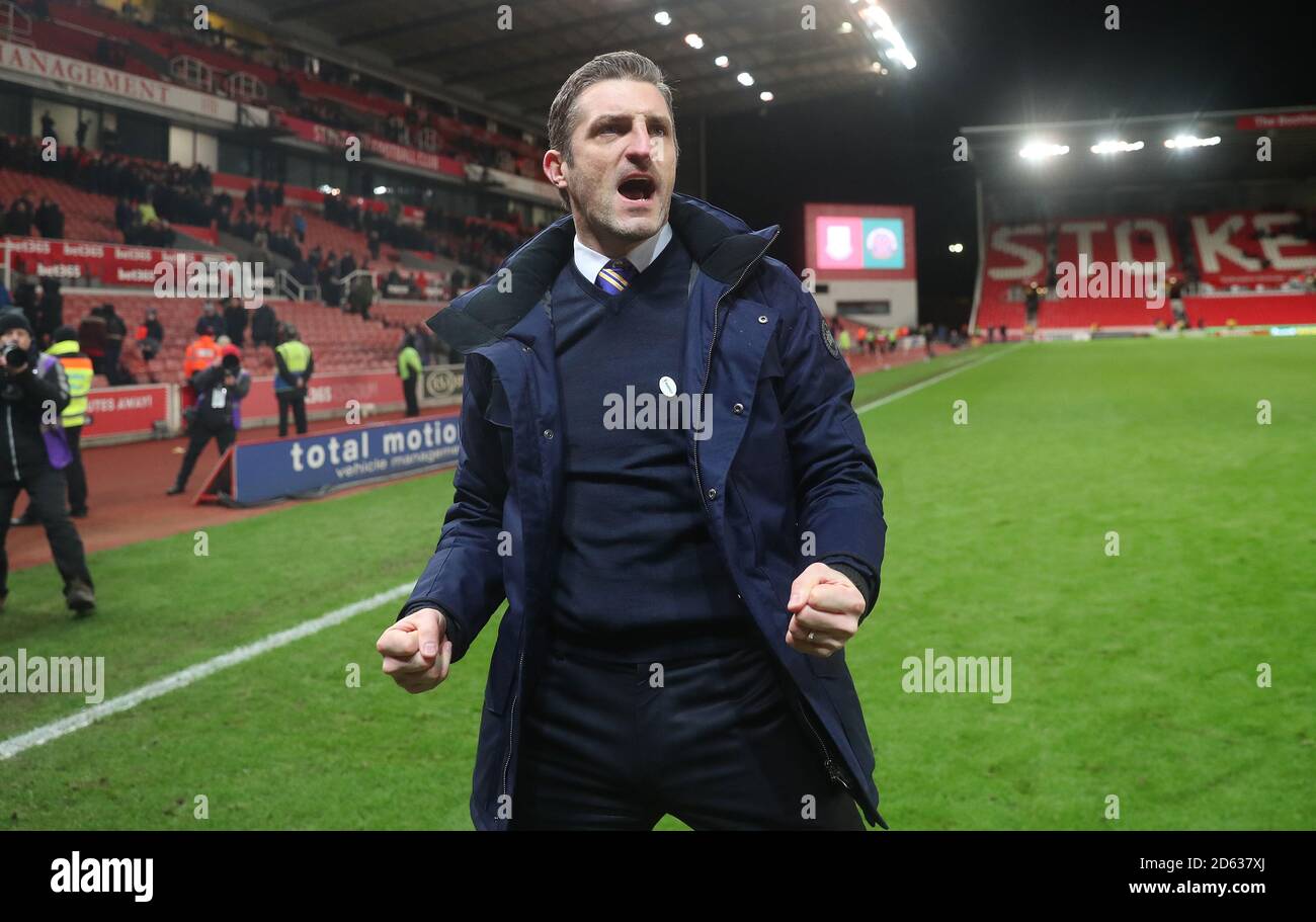Shrewsbury Town's manager Sam Ricketts celebrates at the final whistle ...
