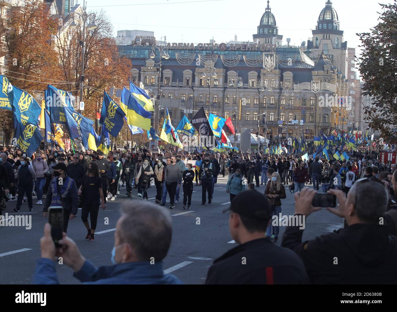 Ukrainian far-right activists holding flags attend the march ...