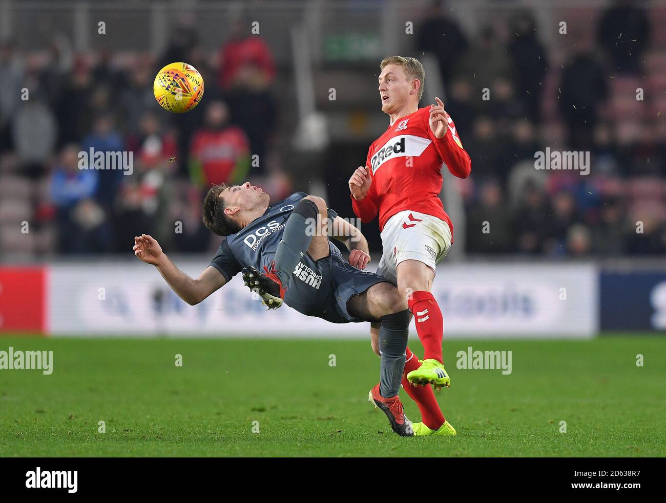 Middlesbrough's George Saville battles with Millwall's Ben Thompson ...