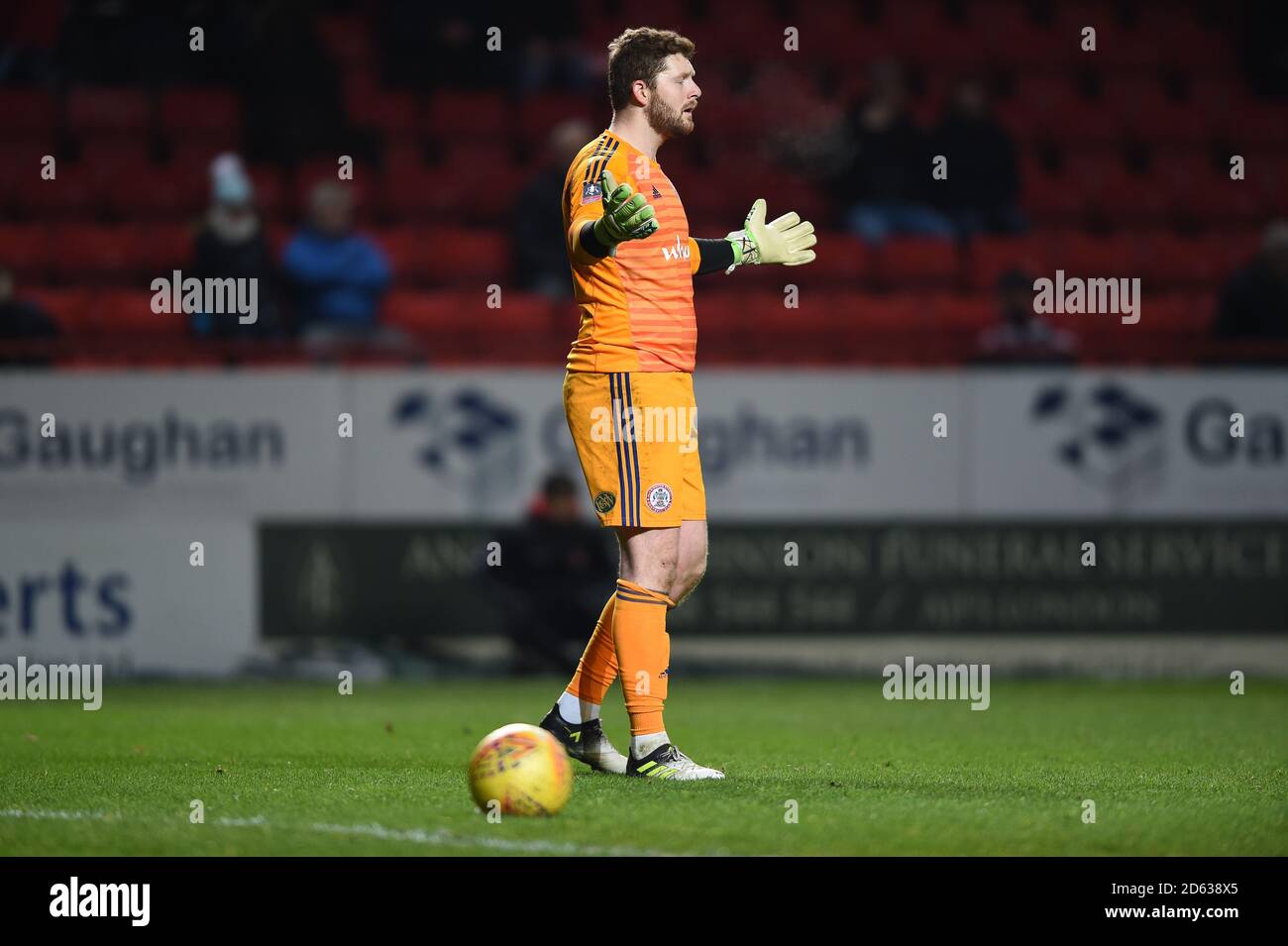 Accrington Stanley goal keeper Jonny Maxted reacts after being shown a ...