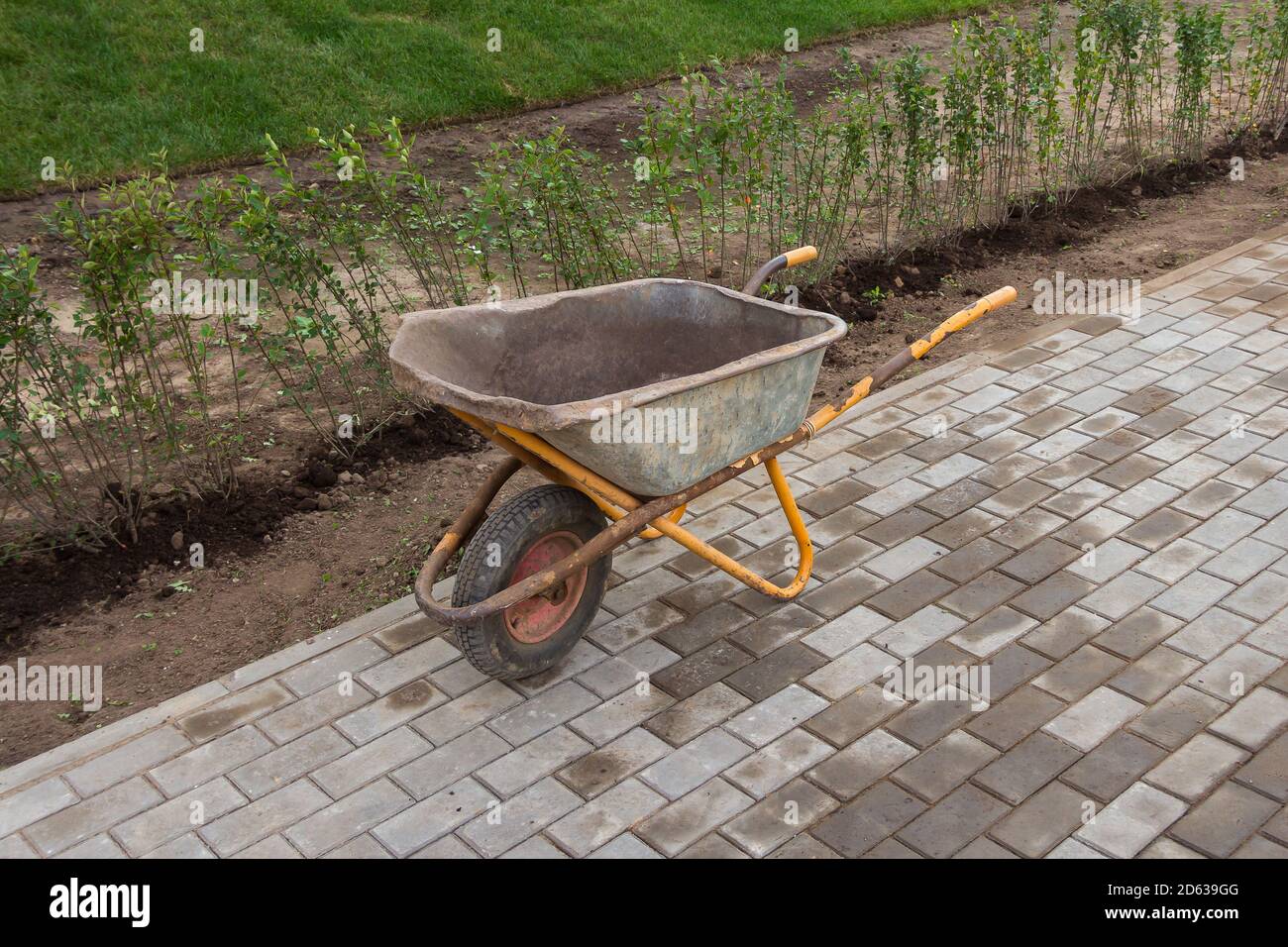 Construction Wheelbarrow for the transport of bulk cargo. Equipment for ...