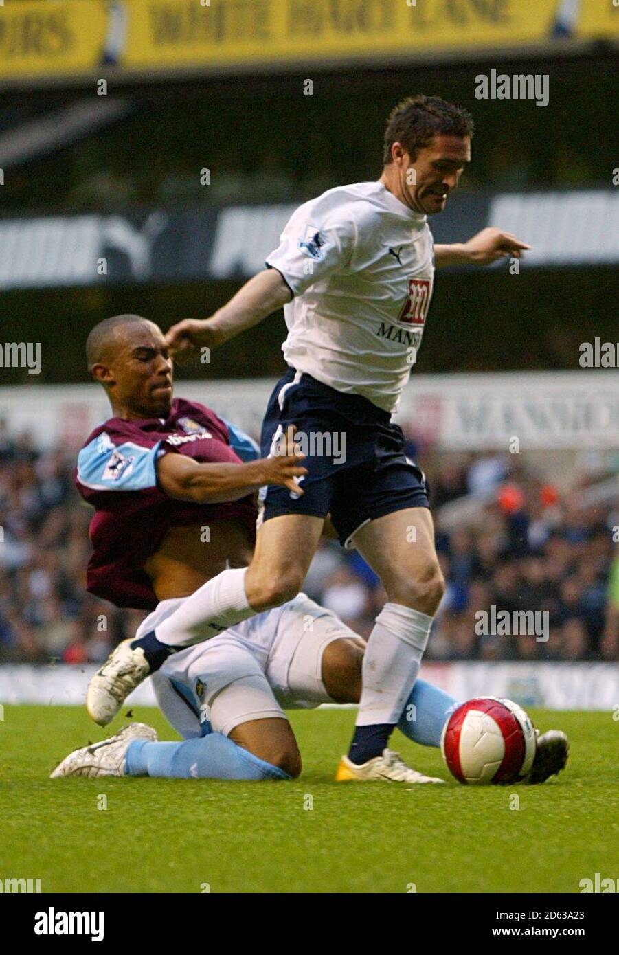 Tottenham Hotspurs' Robbie Keane and West Ham United's Daniel Gabbidon ...