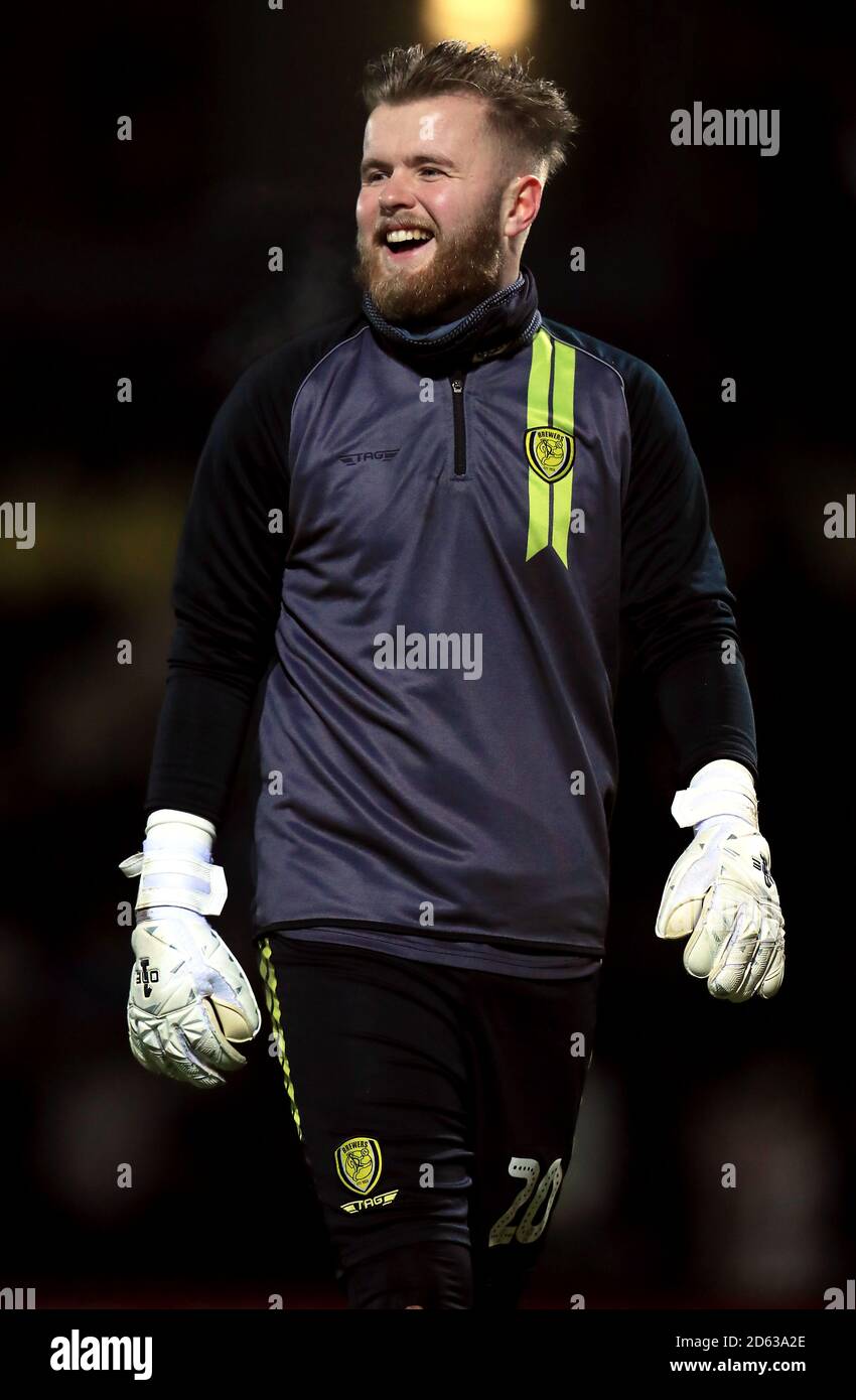 Burton Albion goalkeeper Harry Campbell warming up before the game ...