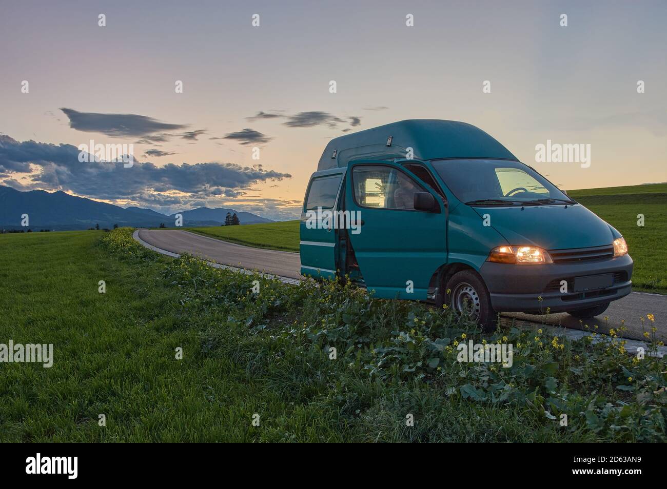Campervan in the bavarian alps Stock Photo - Alamy
