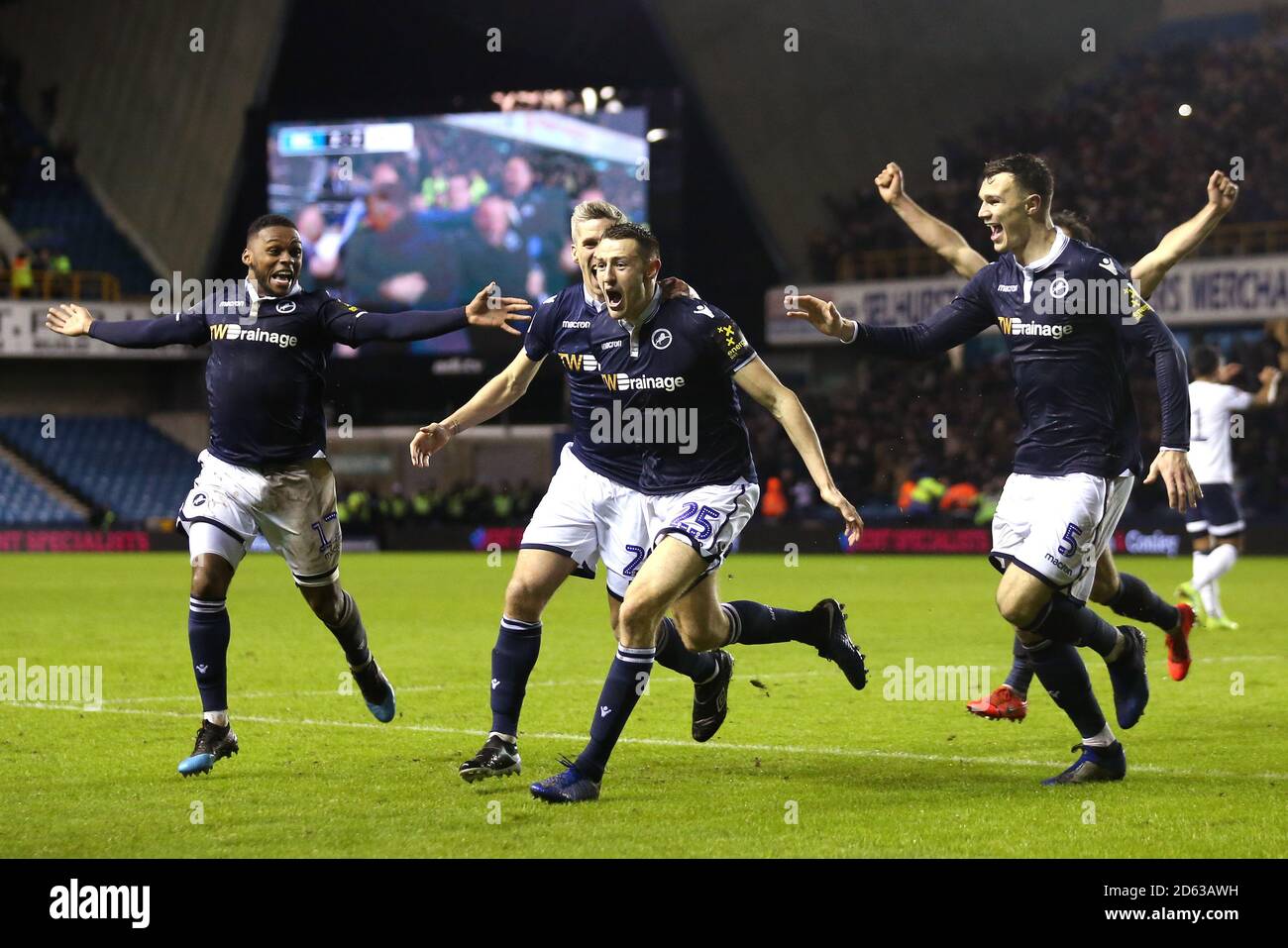 Millwall's Jake Cooper (centre) celebrates his side's second goal of ...