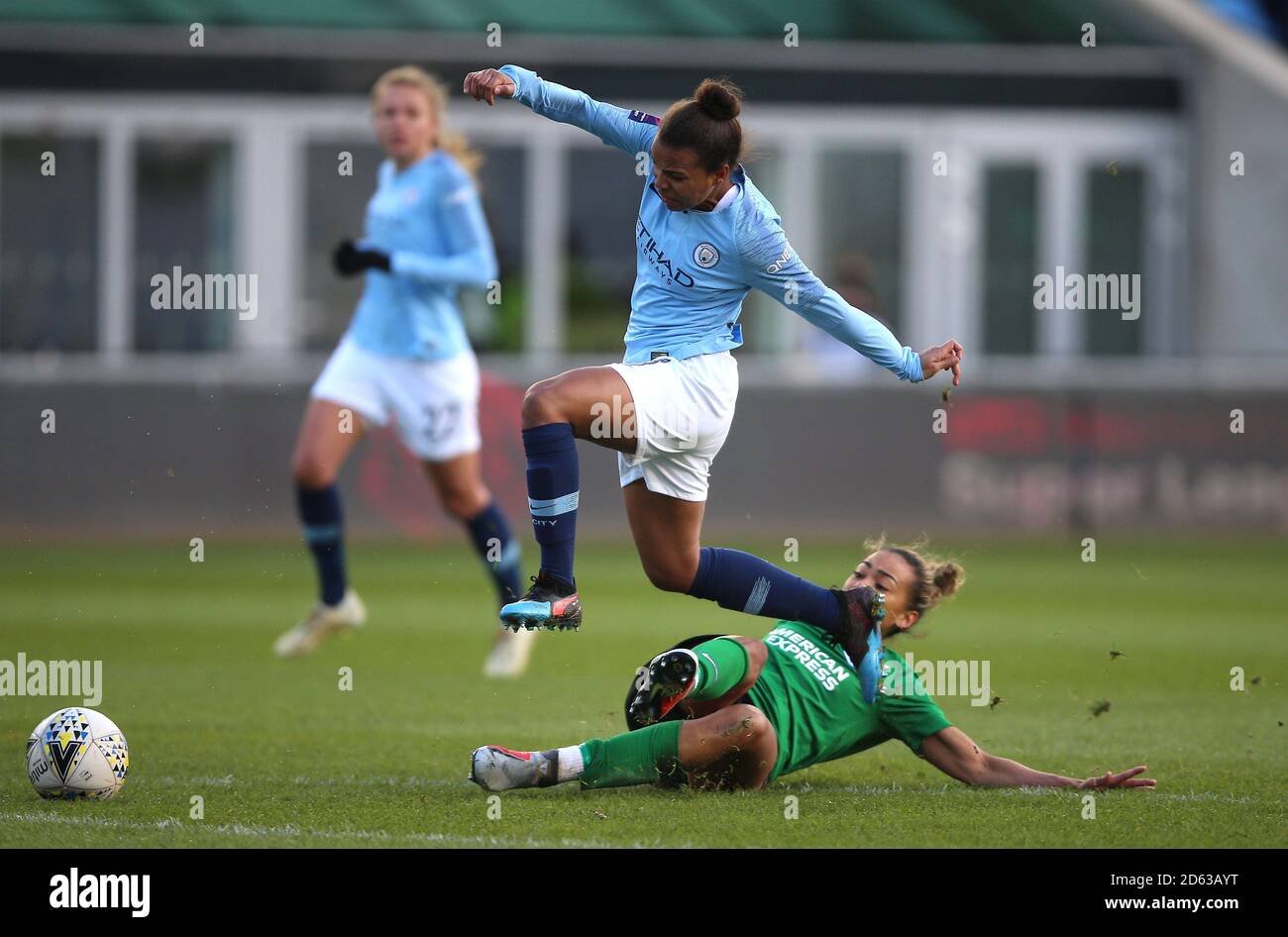 Manchester City's Nikita Parris (centre) and Brighton and Hove Albion's ...