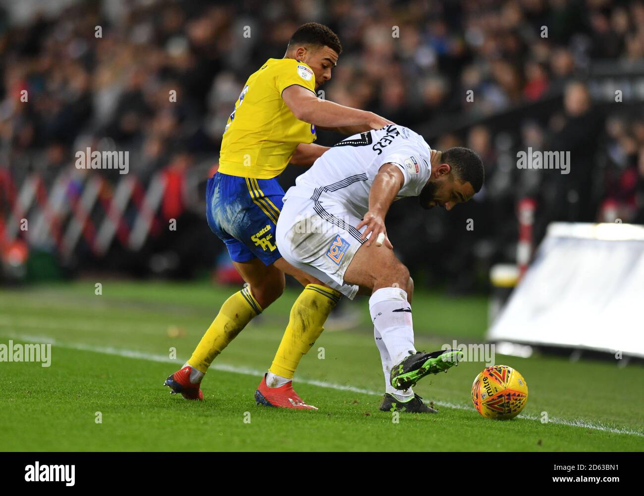 Birmingham City's Che Adams (left) and Swansea City's Cameron Carter ...
