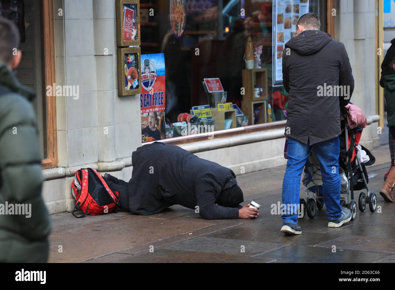 A man begging for money on the streets of London Stock Photo - Alamy