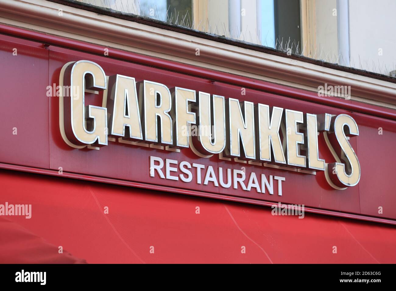 A view of a sign for a Garfunkel's restaurant in London Stock Photo - Alamy