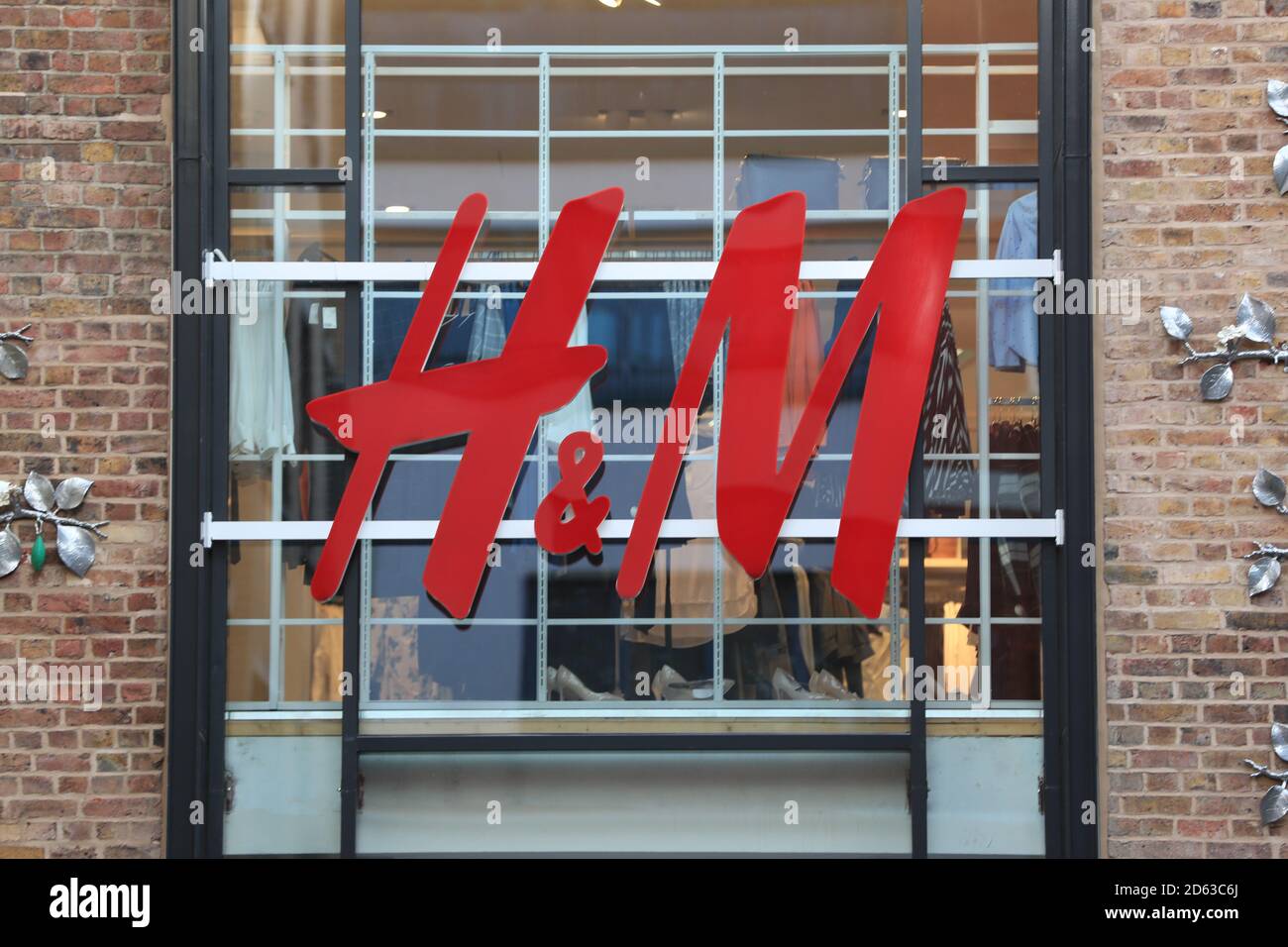 A view of a sign for a H&M clothing retail shop in London Stock Photo ...