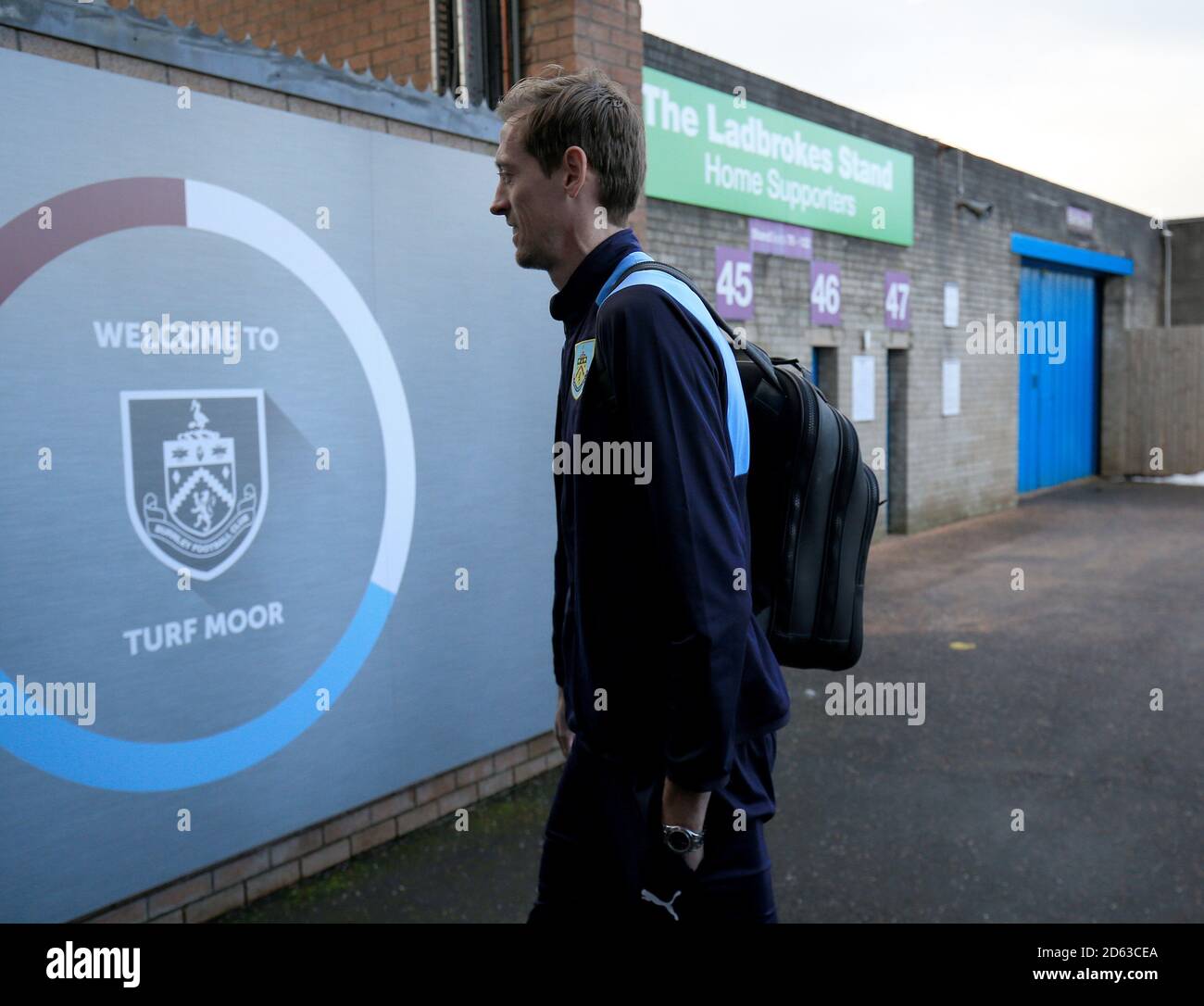 Burnley's new signing Peter Crouch makes his way into the ground before ...