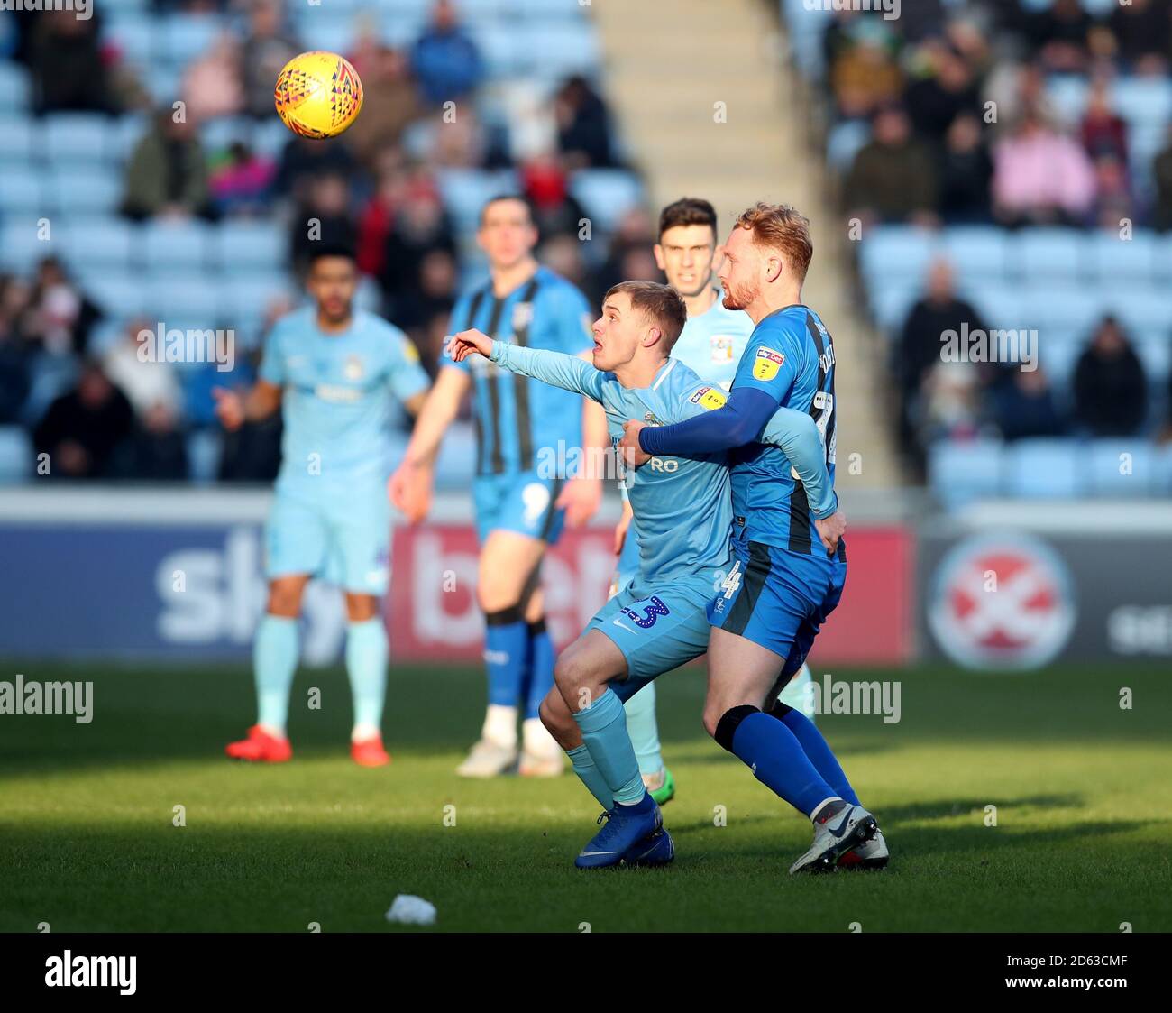 Coventry City's Luke Thomas and Gillingham's Josh Rees battle for the ...