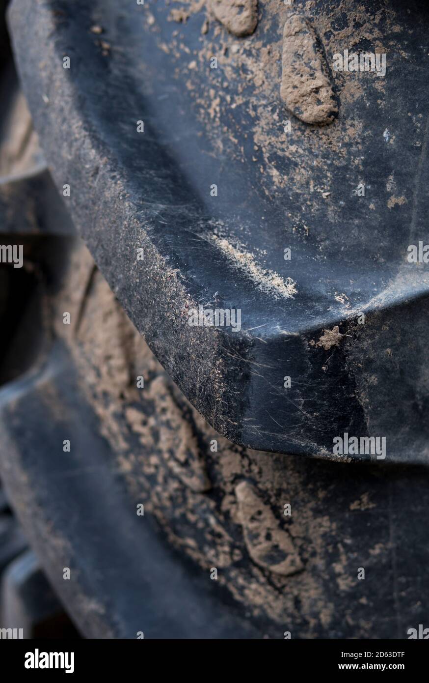 detail of old tractor tire covered with dirt Stock Photo - Alamy