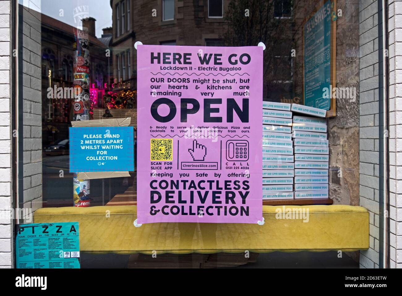 Sign on the window of a Pizza restaurant in Edinburgh with instructions ...