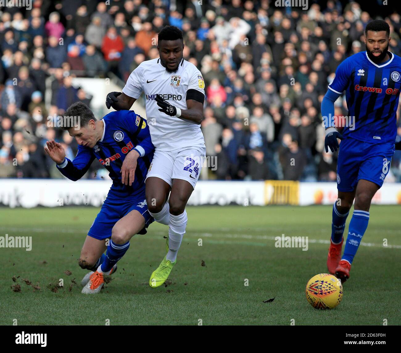 Rochdale's Jimmy McNulty tackles Coventry City's Bright Enobakhare ...