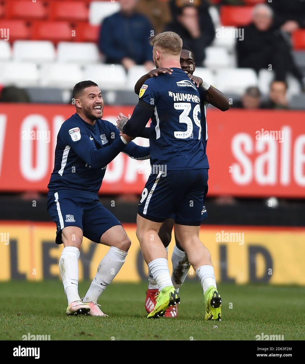 Southend United's Michael Knightly (facing) celebrates with goal scorer ...
