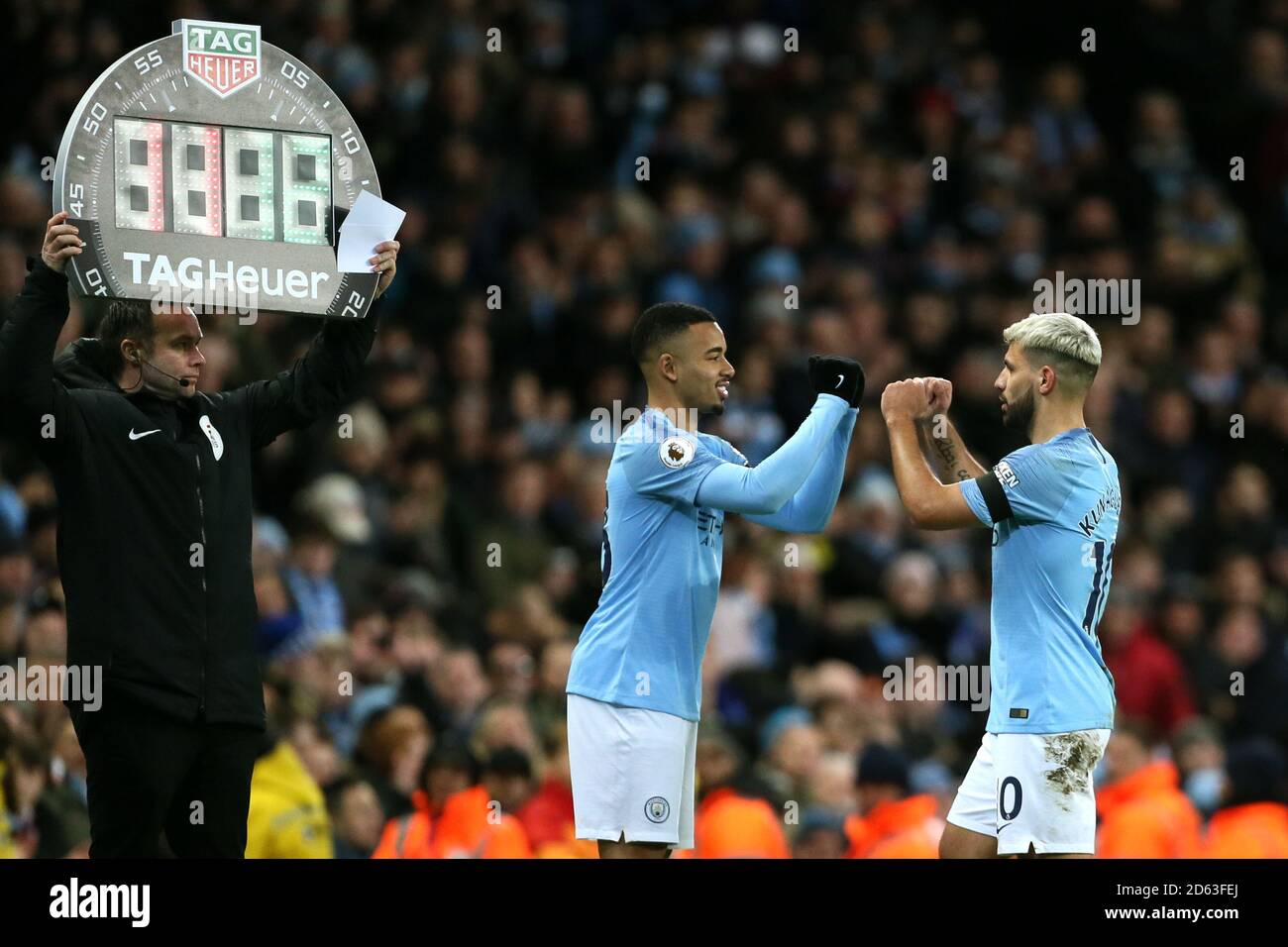 Manchester City's Sergio Aguero (right) is substituted by Gabriel Jesus ...