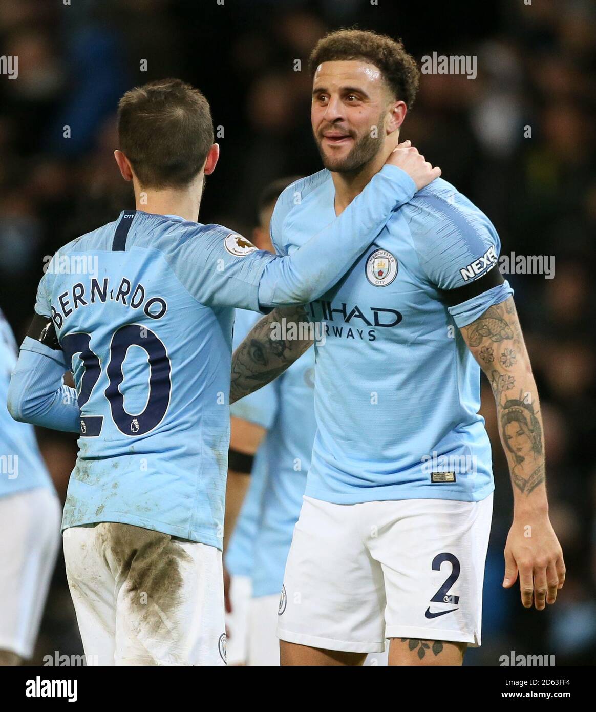 Manchester City's Bernardo Silva (left) and Manchester City's Kyle ...