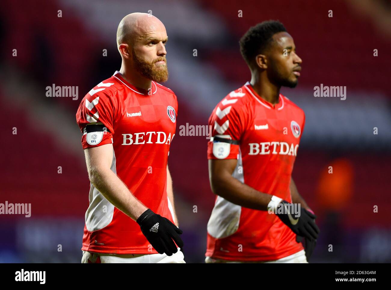 Charlton Athletic's Jonathan Williams (left) leaves the pitch after the ...