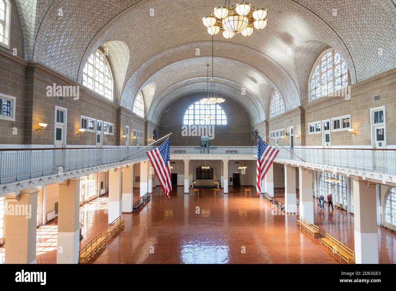 Ellis island great hall with flags hi-res stock photography and images ...