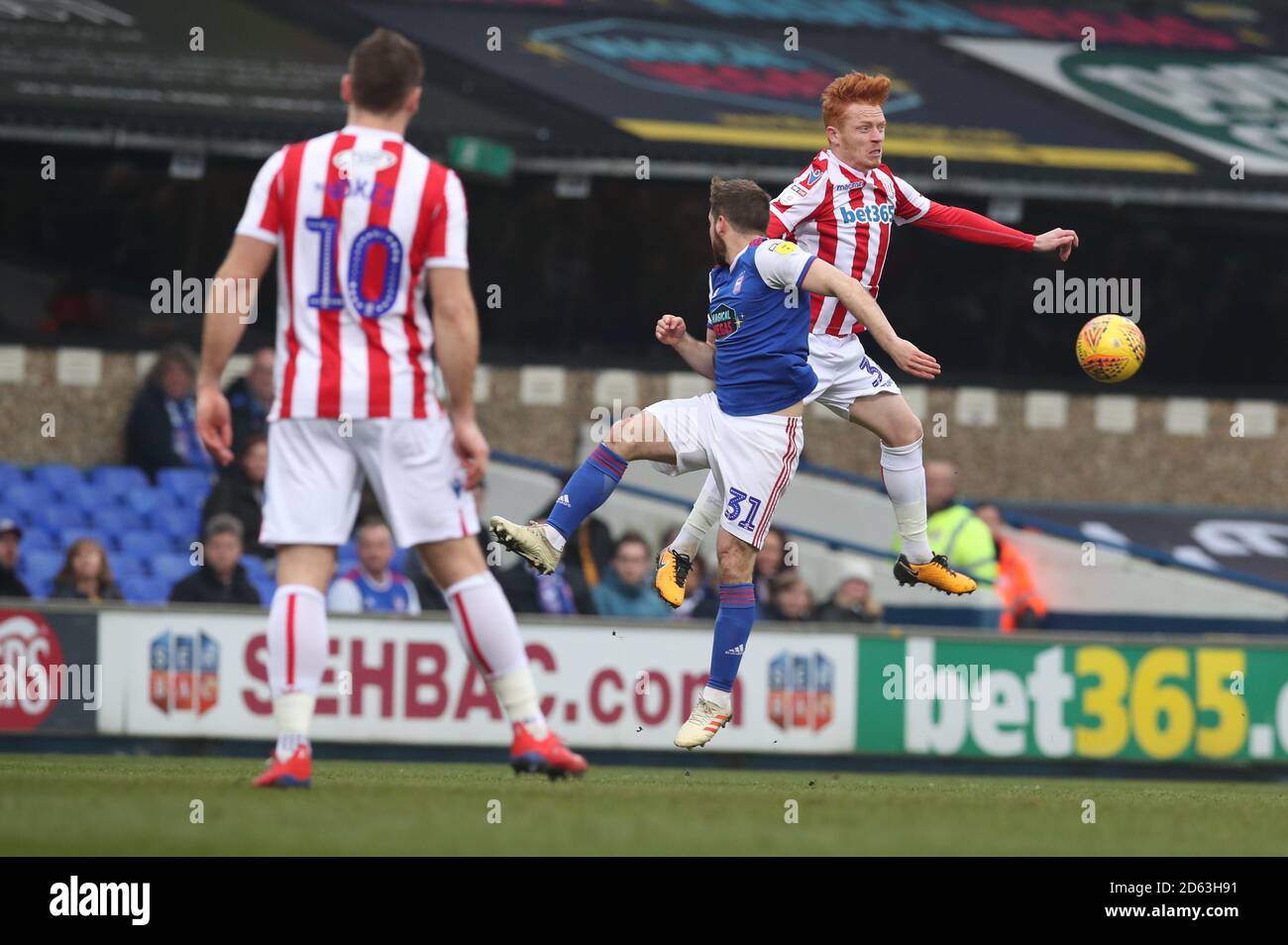 Stoke City's Ryan Woods and Ipswich town's Alan Judge challenges] for ...