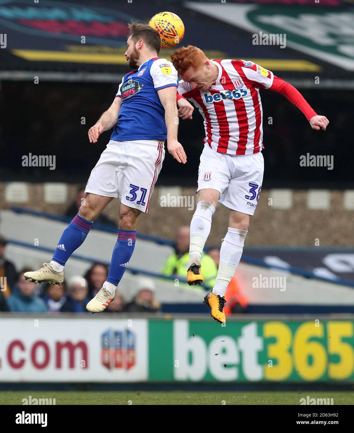 Stoke City's Ryan Woods and Ipswich town's Alan Judge challenges] for ...
