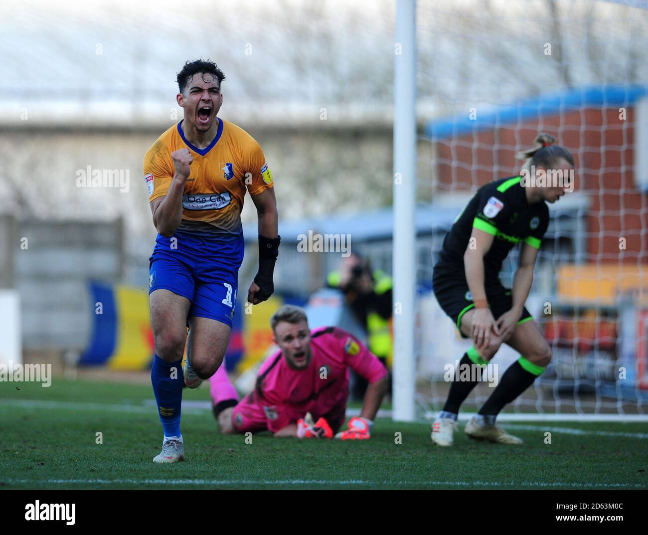 Mansfield Town's Tyler Walker celebrates his first goal of the match ...