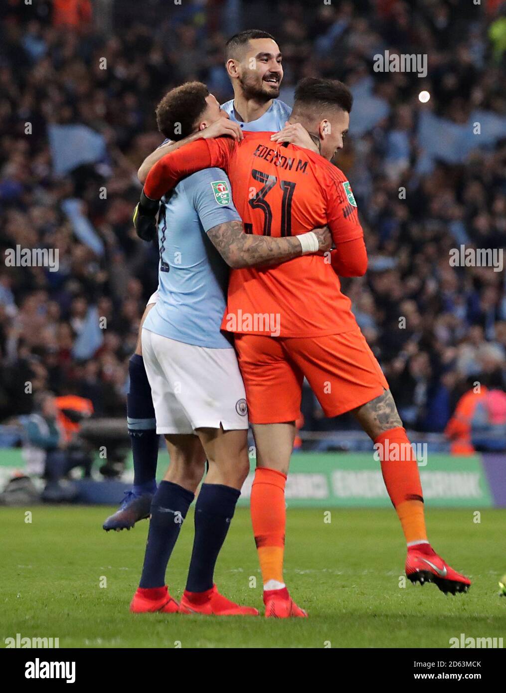 Manchester City's Kyle Walker, Manchester City's Ilkay Gundogan and ...